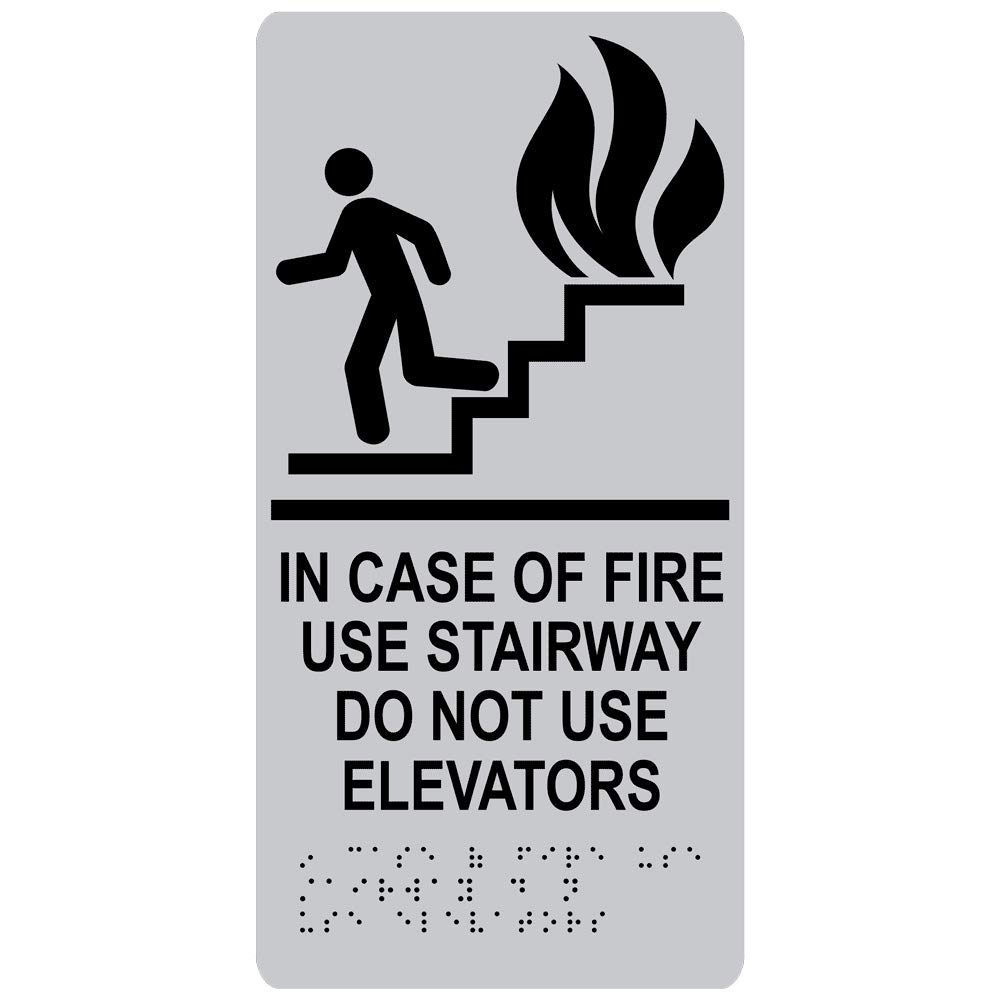 ComplianceSigns.com in Case of Fire Use Stairway Sign, ADA-Compliant Braille and Raised Letters, 12x6 in. Black on Silver Acrylic with Mounting Strips