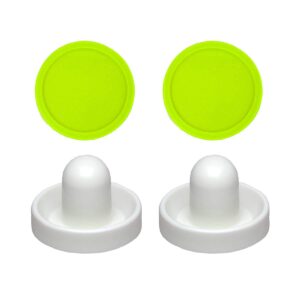 2 commercial hockey fluorescent white goalies with 2 large green air pucks