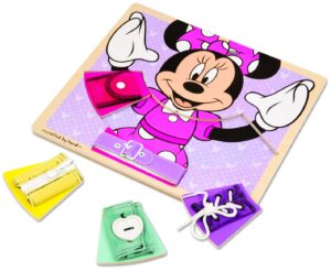 melissa & doug disney minnie mouse wooden basic skills board - zip, lace, tie, buckle, button, and snap