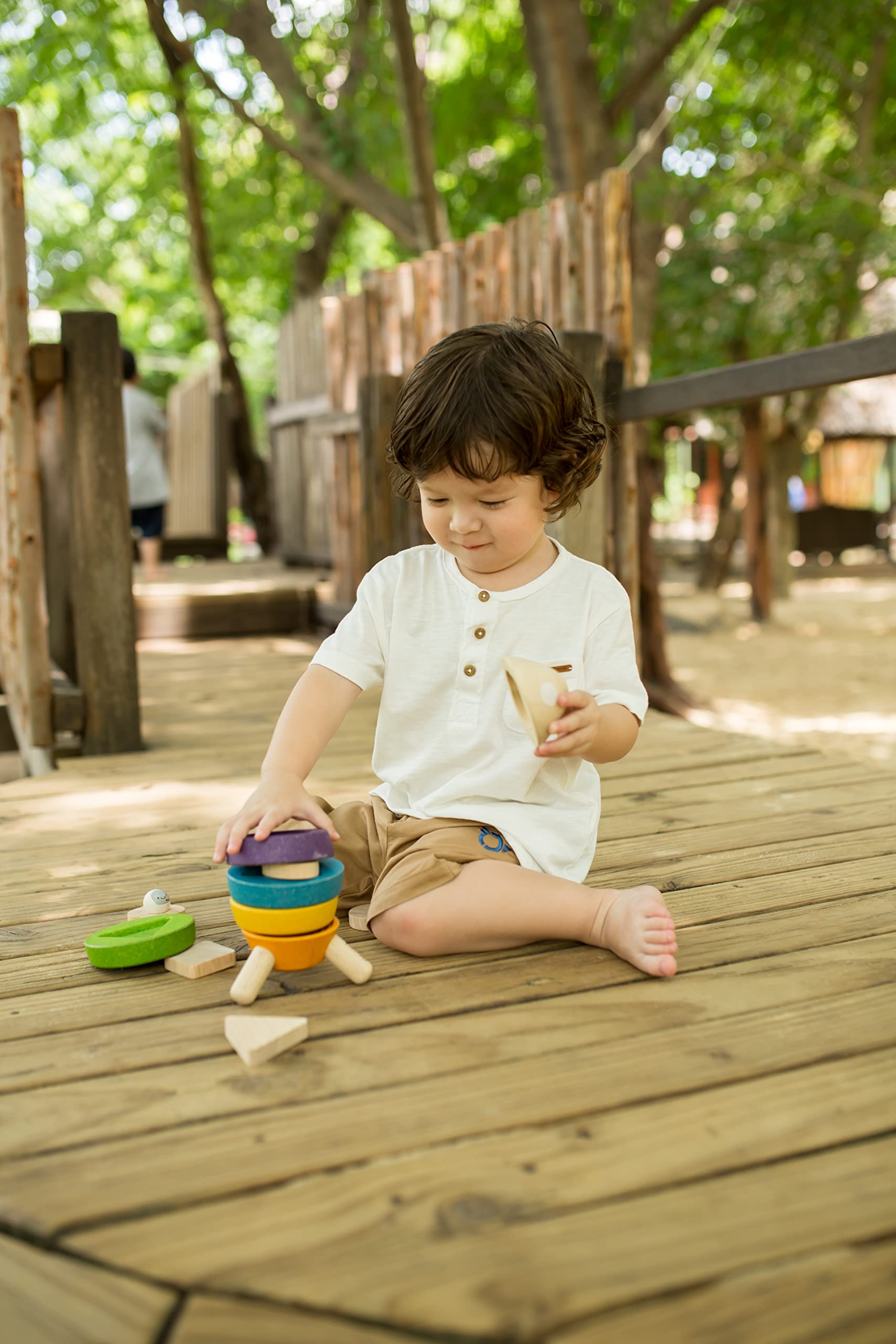 PlanToys Wooden Sorting and Stacking Rocket with Astronaut (5694) | Sustainably Made from Rubberwood and Non-Toxic Paints and Dyes | Eco-Friendly PlanWood