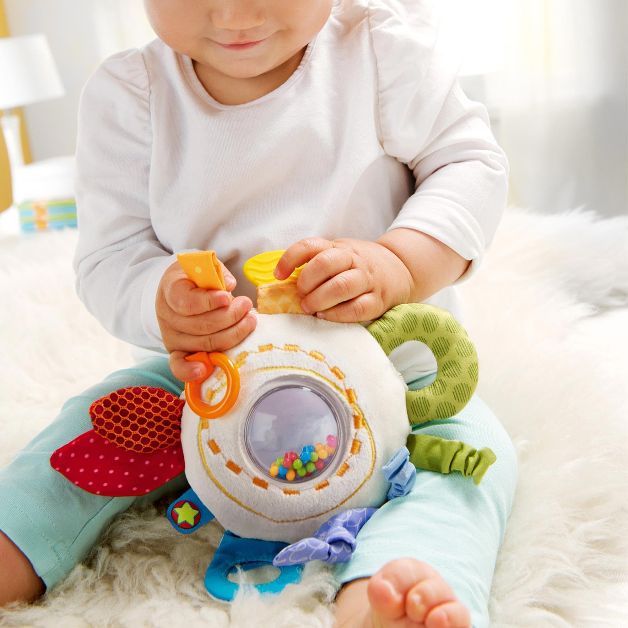 HABA Teether Cuddly Rainbow Round - Soft Activity Toy with Rattling & Teething Elements,Multicolored