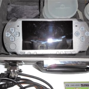 BUNDLE Sony PlayStation Portable PSP , 1 Family Guy Game, 1 Daxter game, 1 Metal Aluminum carrying case , power cords