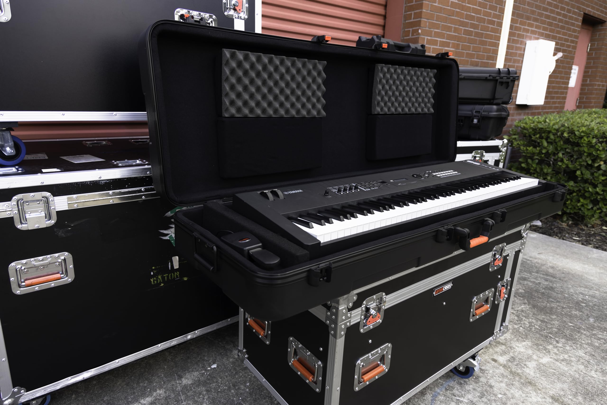 Gator Cases Molded Flight Case for Deep 88-Note Keyboards with TSA Approved Locking Latches and Recessed Wheels; (GTSA-KEY88D)