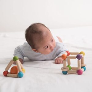 PlanToys Wooden Clutching Triangle Baby Toy with Gentle Sound in Two-Toned Ball (5244) | Sustainably Made from Rubberwood and Non-Toxic Paints and Dyes