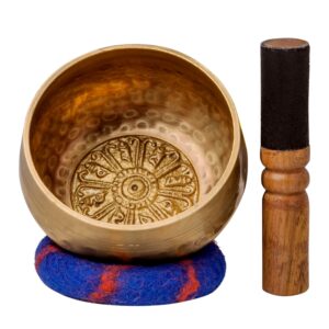 tibetan singing bowl set by the ohm store with 'medicine buddha' engraving — meditation sound bowl and wooden striker handcrafted in nepal — spiritual gift for women and men