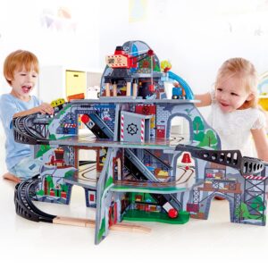 Hape Wooden Railway Mighty Mountain Mine Railway Playset| 4-Level Railway Train Track Playset with Crane and Magnetic Train Cars for Kids