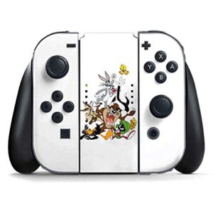 skinit decal gaming skin compatible with nintendo switch joy con controller - officially licensed warner bros looney tunes all together design