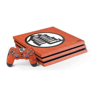 skinit decal gaming skin compatible with ps4 pro console and controller bundle - officially licensed dragon ball z goku shirt design