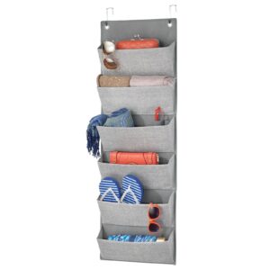 mdesign soft fabric over the door hanging storage organizer with 6 large pockets for closets in bedrooms, hallway, entryway, mudroom - textured print - hooks included - gray