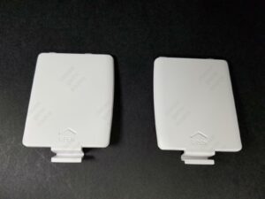 pair of white battery compartment covers lids for the sega game gear