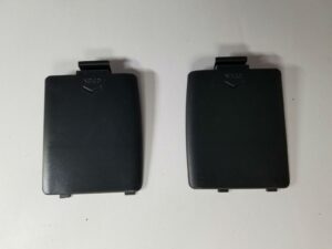 pair of black battery compartment covers lids for the sega game gear