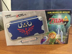 new nintendo 2ds xl hylian shield ed., w/ legend of zelda: a link between worlds