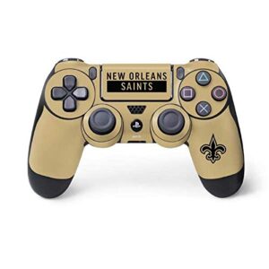 skinit decal gaming skin compatible with ps4 controller - officially licensed nfl new orleans saints gold performance series design