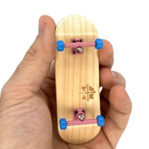 teak tuning 32mm pro fingerboard complete - fully assembled with pro level components - pro shaped wooden deck (32x97mm), ultraspin bearing wheels, prodigy gen2 trucks - cotton candy