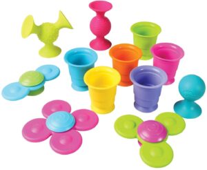 fat brain toys pipsquigz whirly-squigz suction-kupz set - 12 piece early learner toys - 6 suction kupz stacking toys, 3 pipsquigz, 3 whirly squigz spinners in zippered storage case - bpa-free silicone