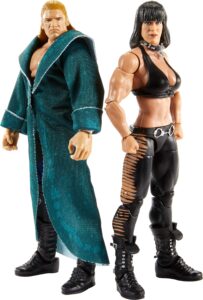 wwe elite collection 2-pack: triple h & chyna 6-in action figures with 2 sets of swappable hands & superstar accessories; ages 8 years old & up ​