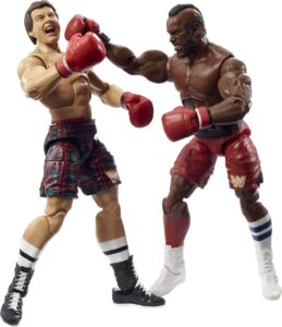 wwe mr. t vs “rowdy” roddy piper elite collection 2-pack 6-in action figure with boxing robes & swappable hands, posable collectible gift for wwe fans ages 8 years old & up