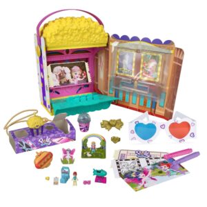 polly pocket un-box-it playset, popcorn shaped box opens to a movie theater adventure, 20 accessories including 2 micro dolls & 3 tiny takeaways