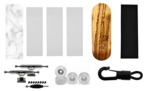 teak tuning fingerboard starter set no. 4 - includes zebrawood fingerboard deck, graphic deck wrap, 3 pieces of skate grip, trick tape, set of silver trucks, clear wheels, and a carrier