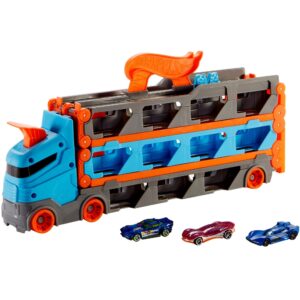 hot wheels speedway hauler storage carrier with 3 1:64 scale cars & convertible 6-foot drag race track for kids 4 to 8 years old, stores 20+ cars & connects to other city sets, gvg37