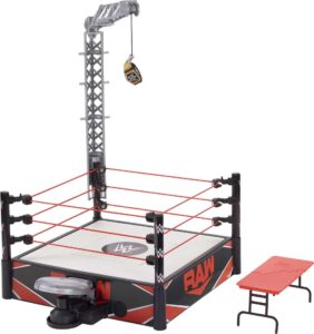 mattel wwe wrekkin' kickout ring playset with accessories & 2 play modes, includes launcher, crane, wwe championship & more, 13-inch x 20-inch