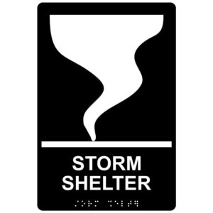 compliancesigns.com storm shelter sign, ada-compliant braille and raised letters, 9x6 in. white on black acrylic with adhesive mounting strips