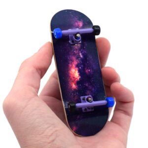 teak tuning 34mm pro fingerboard heat transfer graphic complete - fully assembled with pro level parts - pro shaped wood deck (34x97mm), ultraspin wheels, prodigy trucks - galaxy