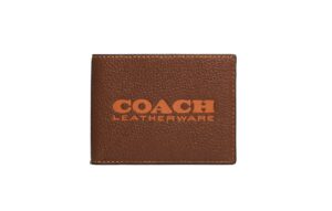 coach slim billfold in pebble leather with coach leatherware branding dark saddle/canyon one size