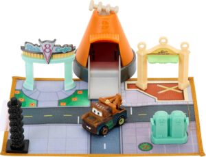 mattel disney and pixar cars toys, mini racers dino park playset with 2 mini vehicles, accessories & portable case