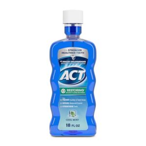 act restoring fluoride mouthwash 18 fl. oz. strengthens tooth enamel, cool mint