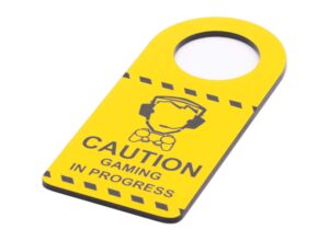 high visibility yellow and black do not disturb gaming door hanger sign