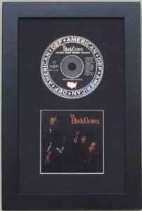 cd frame featuring black matting and black moulding