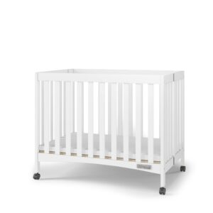 child craft london mini compact folding portable crib with 2” crib mattress and 2 easy roll locking wheels, durable pine wood construction (matte white)