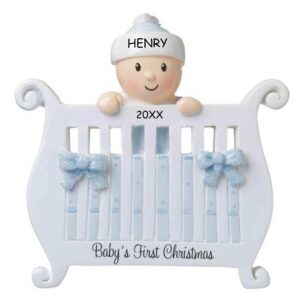 personalized baby in a crib first christmas ornament (blue)