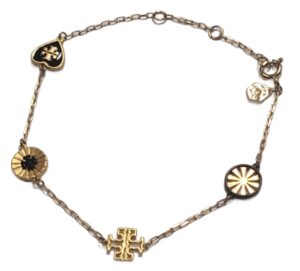 tory burch 136016 britten rolled brass black accent enamel women's charm bracelet