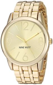 nine west women's nw/1578chgb champagne dial gold-tone bracelet watch